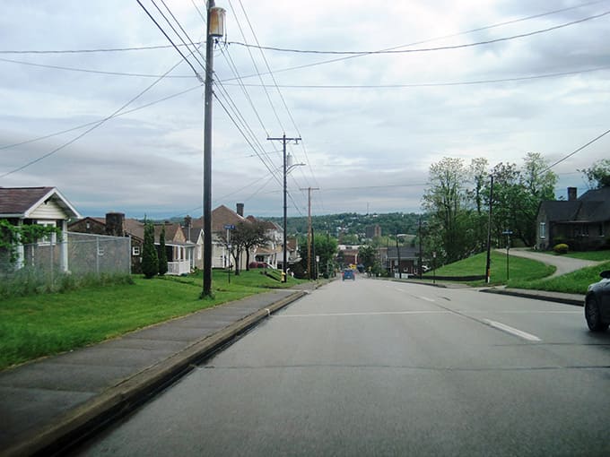 Connellsville's residential hillside rolls gently toward the horizon, all green lawns and sturdy older homes built for real life.