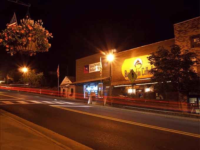 Big Mountain Coffee glowing at night like a warm invitation you simply cannot refuse.