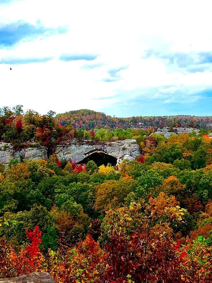 Fall colors explode around the arch in a riot of reds and oranges that would make any painter jealous.