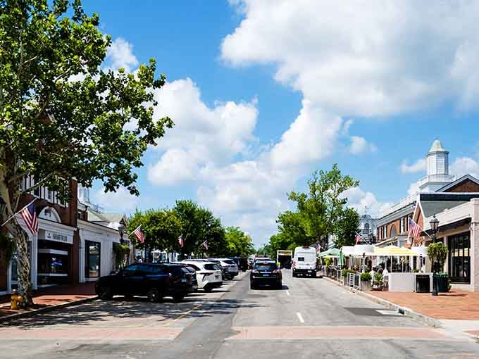 American flags, outdoor caf&eacute; seating, and a gleaming cupola make New Canaan's sun-soaked avenue feel like the Fourth of July decided to stay permanently.