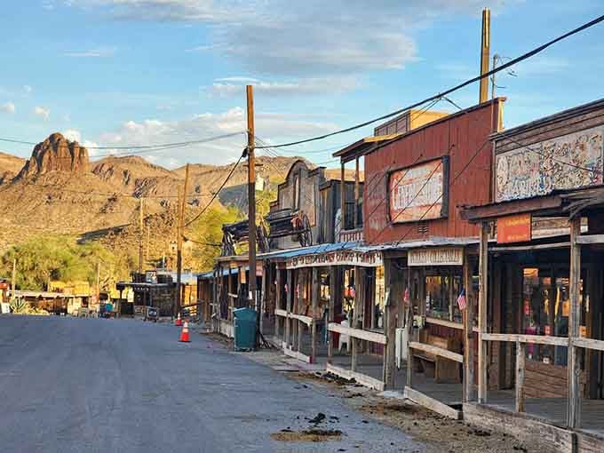 Golden hour hits Oatman's wooden storefronts like a spotlight, turning this scrappy old mining town into something straight out of a John Ford film.