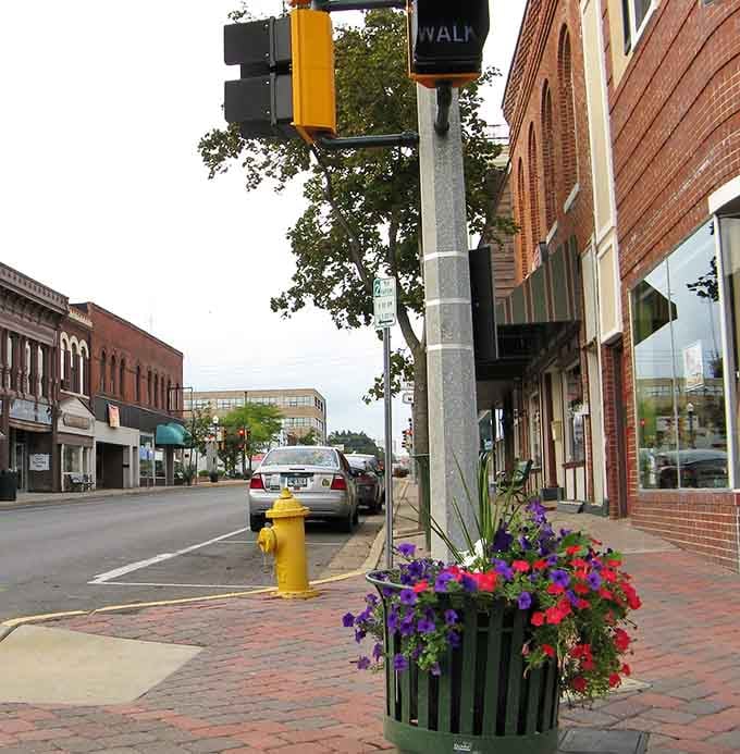 Rolla's sidewalk flower planter bursts with purple and red petunias, proof that this town puts genuine care into its welcome.