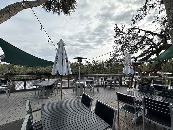 Empty tables won't stay that way long &mdash; the Myakka River backdrop makes every seat the best seat.