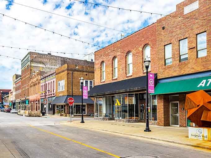 String lights overhead and historic storefronts below make every meal feel like a special occasion worth savoring.