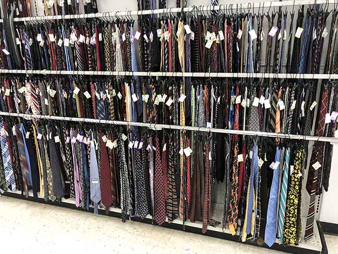 Hundreds of ties hanging in perfect rows, because someone out there needs exactly this one for Monday morning.