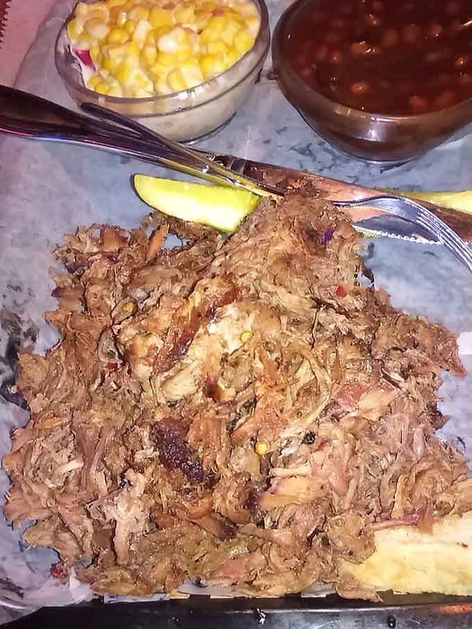 Pulled pork piled high enough to make architectural engineers nervous but barbecue lovers absolutely ecstatic.