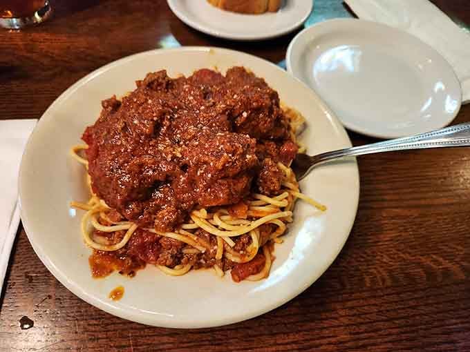 That meat sauce is piled so generously on the spaghetti, the pasta is basically just a delicious delivery system.