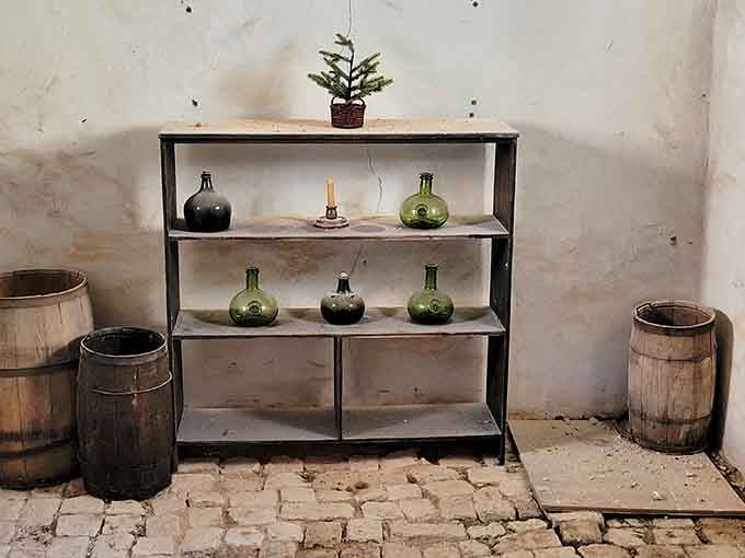 Round green bottles and wooden barrels: colonial storage solutions that somehow look more stylish than your kitchen pantry.