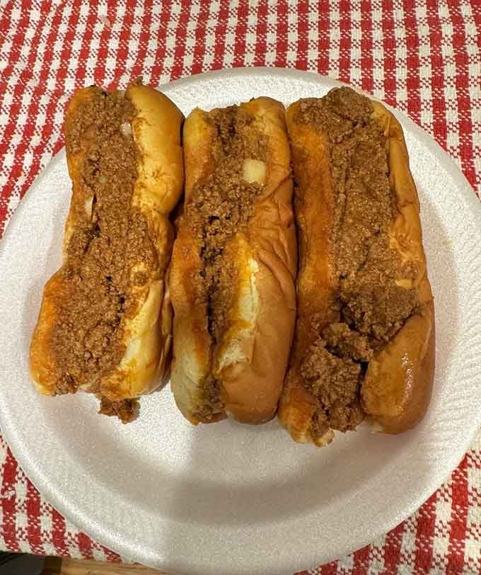 Three chili dogs lined up like old friends &mdash; simple, honest, and absolutely not messing around.