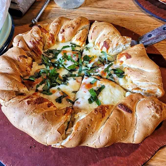 Fresh basil, melted mozzarella, and a crust baked to golden perfection. Simple ingredients, serious results.