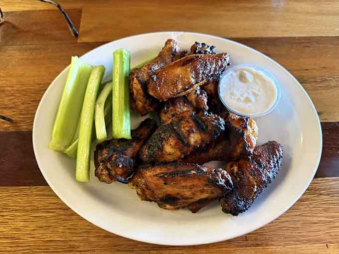 These dry rub wings have that deep, smoky color that tells you everything you need to know before you even take a bite.