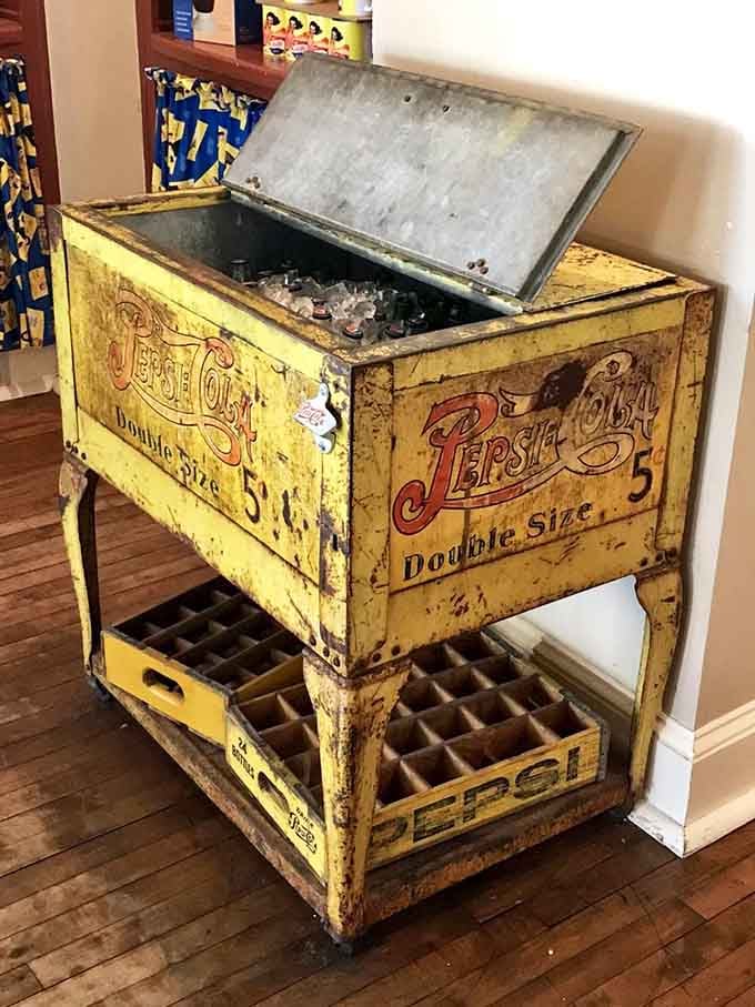This battered yellow cooler once kept Pepsi cold for a nickel a bottle, and it still looks proud about it.