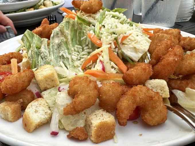Crispy fried shrimp piled high over fresh greens and croutons. This salad is not playing around.