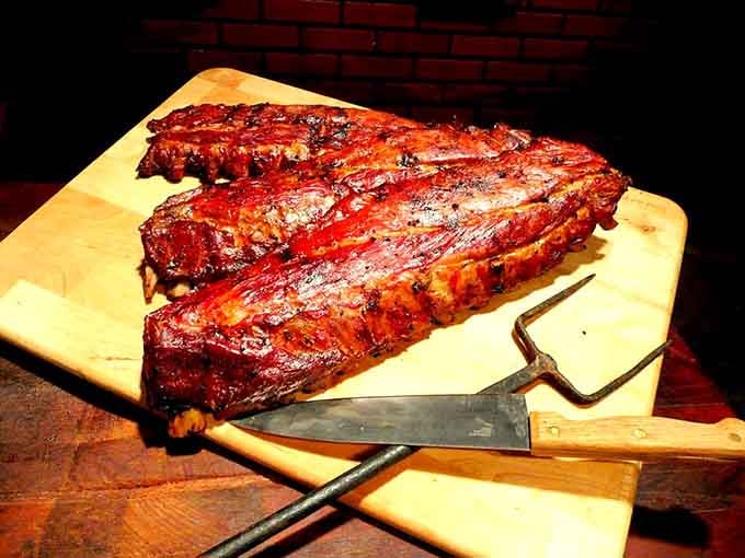 A full rack of pork spare ribs that could make a grown adult completely forget their table manners. Worth it.