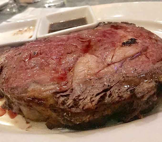 Prime rib so generously portioned it makes you reconsider your understanding of serving sizes entirely.