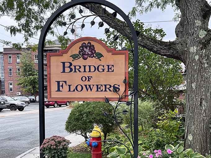 The sign says Bridge of Flowers, but your eyes are already telling you the whole story.