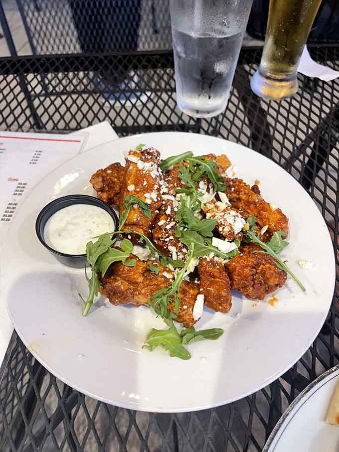Wings topped with arugula and feta cheese transform bar food into something your sophisticated palate will actually respect and crave.