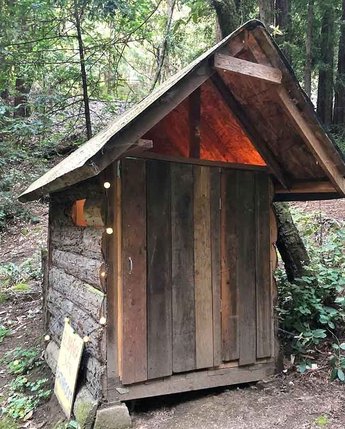 Rustic, handcrafted, and tucked right into the trees. This little restroom has more character than most hotel lobbies.