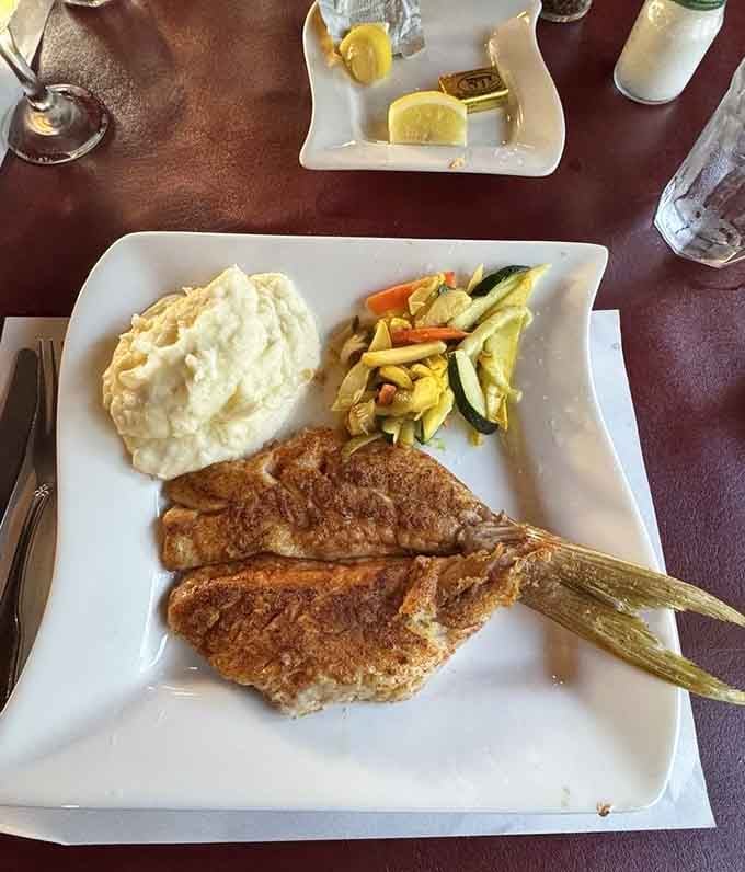 Perfectly seasoned and golden from the fryer, this yellowtail snapper is Florida on a plate, tail and all.