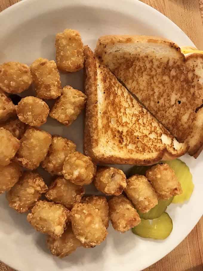 A grilled cheese and tater tots that remind you comfort food never goes out of style.
