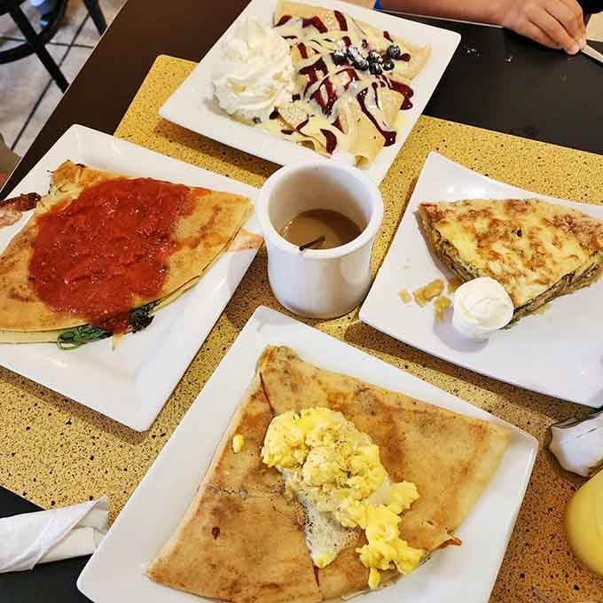 A full table of cr&ecirc;pes, coffee in the middle &mdash; this is what a great Sunday morning looks like, no debate.