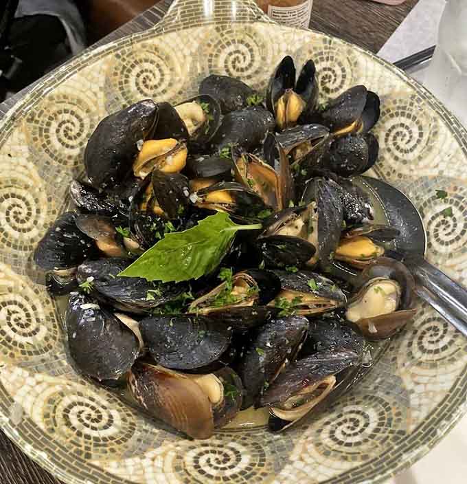 A bowl of mussels this full deserves your complete and undivided attention. No distractions allowed.