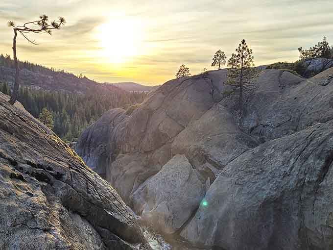 Sunset paints the granite formations in golden light, creating a landscape that belongs on a postcard or screensaver.