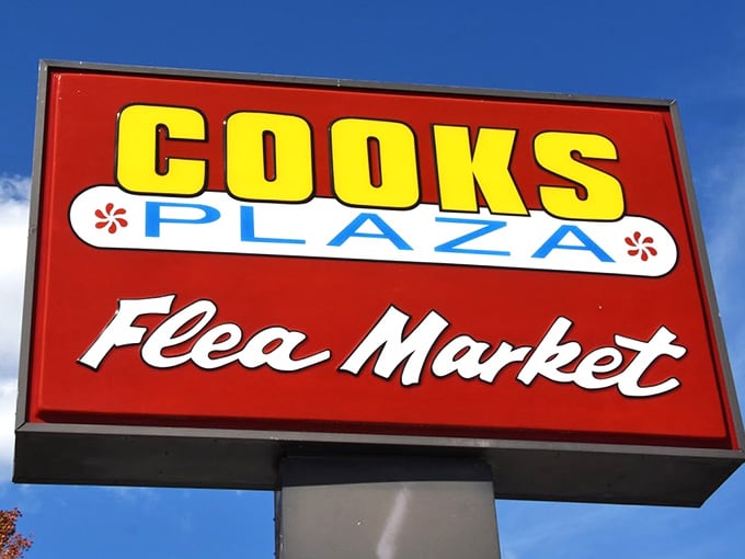 Bold, bright, and impossible to miss, the Cooks Plaza Flea Market sign means business and delivers on it.
