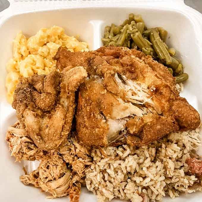 Crispy fried chicken over pulled pork and rice &mdash; Cooper's hot food counter delivers a serious one-two punch.