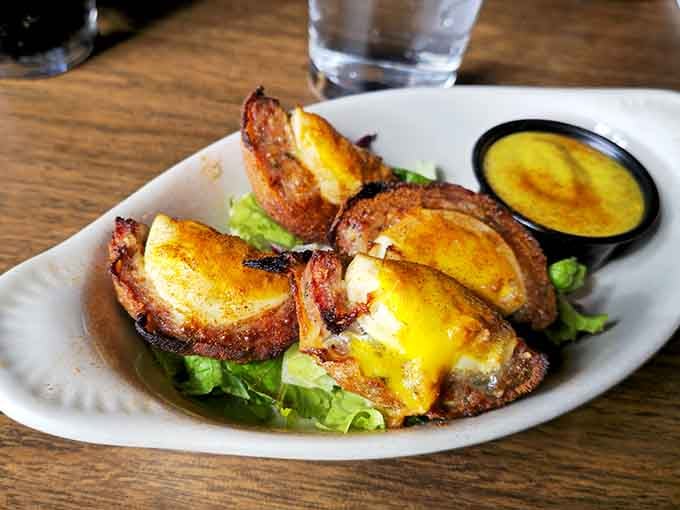 Scotch eggs wrapped in bacon are basically breakfast's greatest achievement, served any time of day you crave them.