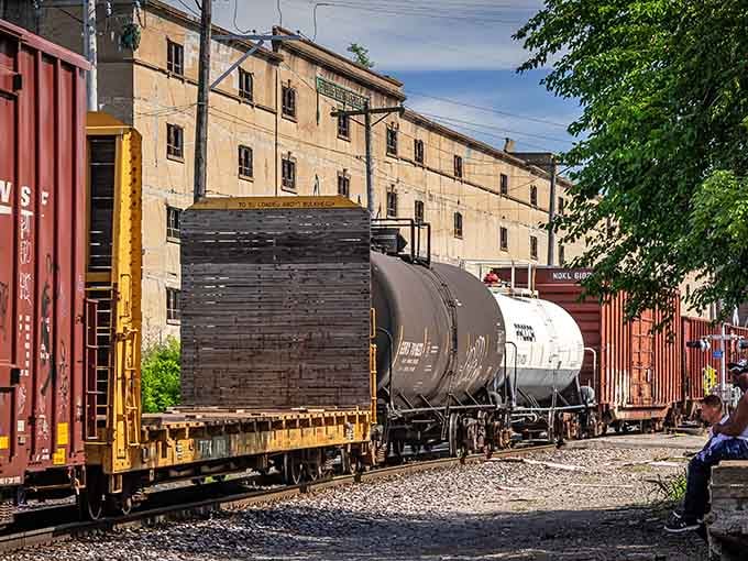 Trains still rumble past this sleeping giant, a reminder that some things keep moving while others stand still.
