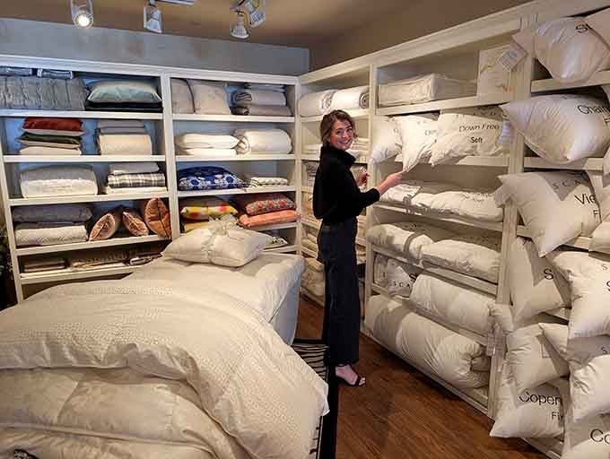Fluffy pillows stacked floor to ceiling, this is what a good night's sleep looks like before you take it home.