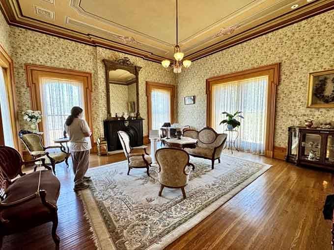 Floral wallpaper, carved woodwork, and period furniture that makes your living room feel like it owes someone an apology.
