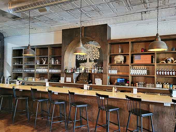 That gorgeous wooden bar at Appalachian Heritage Distillery looks like it was built specifically for good conversations.