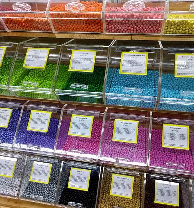 A rainbow wall of Sixlets in every shade imaginable, proof that candy can absolutely double as modern art.