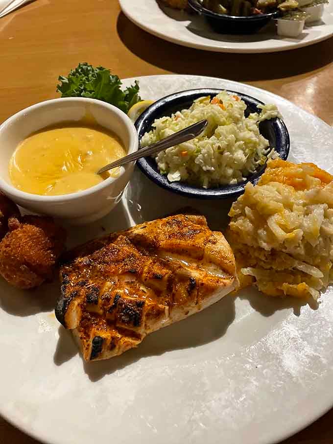 Perfectly grilled fish with sides that actually complement instead of just filling space on the plate.