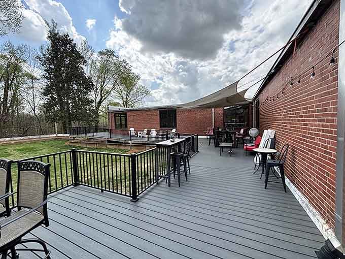 A brick-walled outdoor deck where good company and open sky are always on the menu.