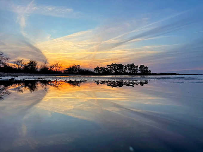 Winter sunsets at Ferry Point Park are the kind that make you pull over, stare, and completely forget dinner plans.