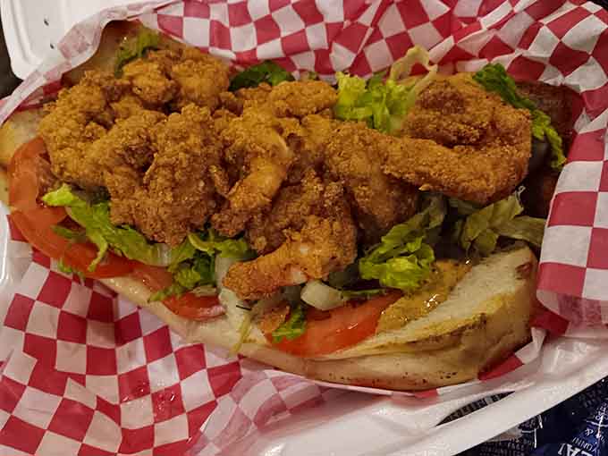 That shrimp po' boy is stuffed so full, the bread is basically just a suggestion at this point.