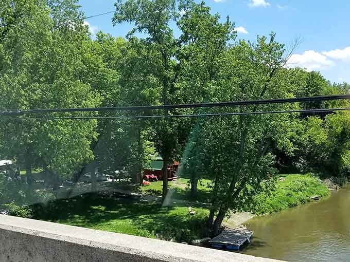 Tucked below the bridge and behind the trees, the Fox Hollow base camp feels like a secret worth keeping.