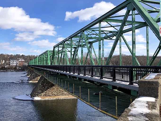 The Uhlerstown-Frenchtown Bridge stretches green and proud across the Delaware. Old steel, big sky, zero complaints.