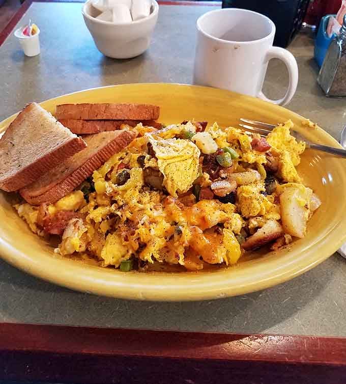 The Kielbasa Scramble turns morning eggs into a hearty celebration of sausage, cheese, and pure comfort.