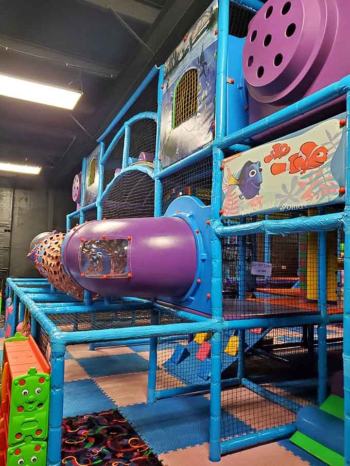 A multi-level soft play structure that makes kids disappear faster than snacks at a birthday party.