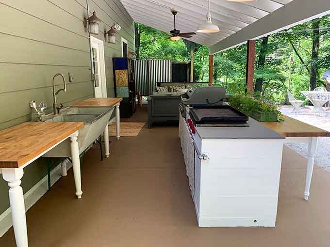 An outdoor kitchen under a covered porch. Michigan weather, you've met your match.