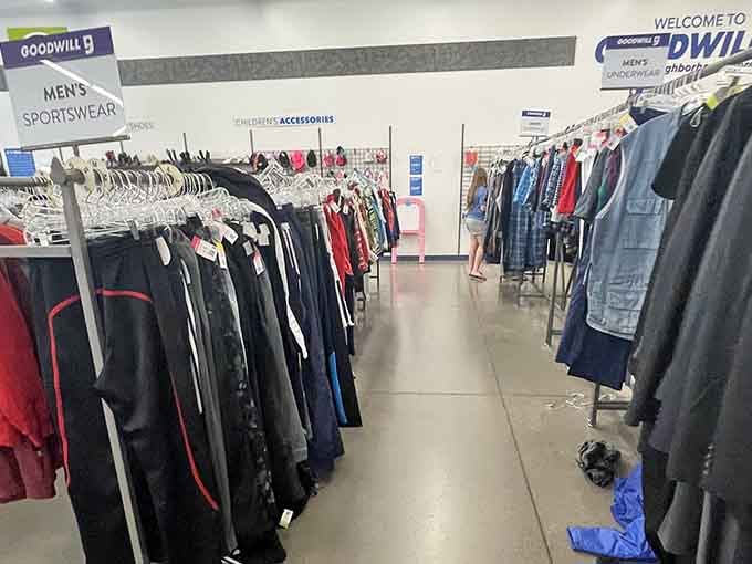 Long racks of men's sportswear line the aisles, proof that someone else's closet cleanout is your wardrobe upgrade.