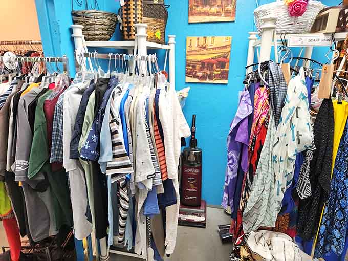 Colorful shirts and casual tops hang side by side, proof that someone in Phoenix has excellent taste and generous instincts.