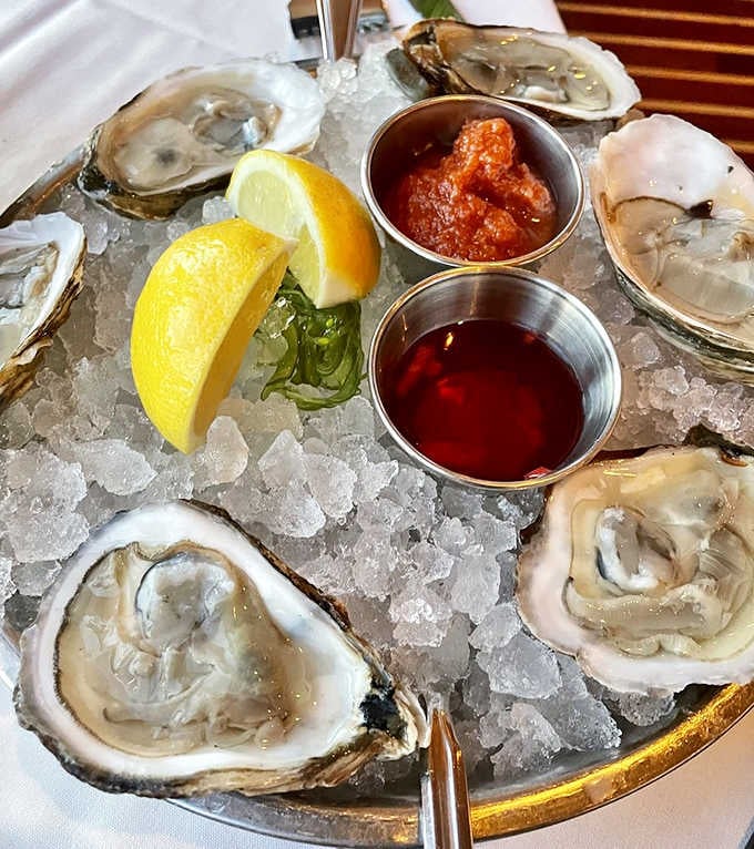 Six Blue Point oysters on crushed ice, lemon wedges gleaming nearby. The ocean called, and it wants you to eat well.