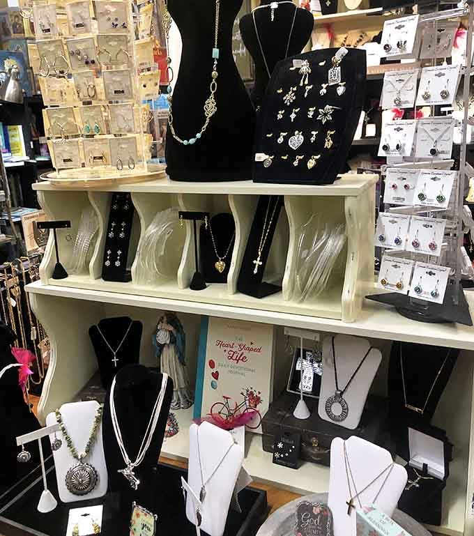 Necklaces, earrings, and pendants lined up like they're auditioning for a spot around your neck.