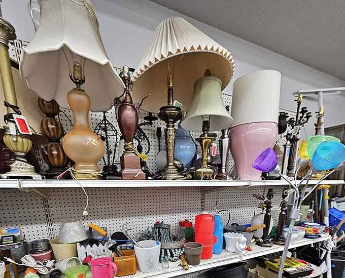 A whole congregation of lamps in every shape and shade, from brass candlestick to pink ceramic, all waiting to light up your living room.