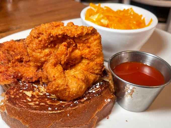 Crispy fried chicken perched atop French toast proves that sweet and savory were always meant to be together.